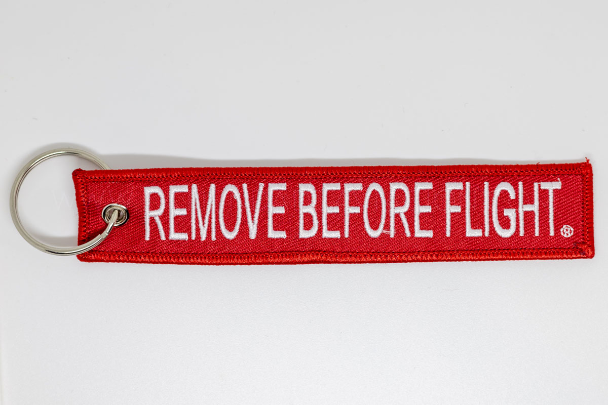 Llavero - Remove before flight rojo - - La tienda de aviacion